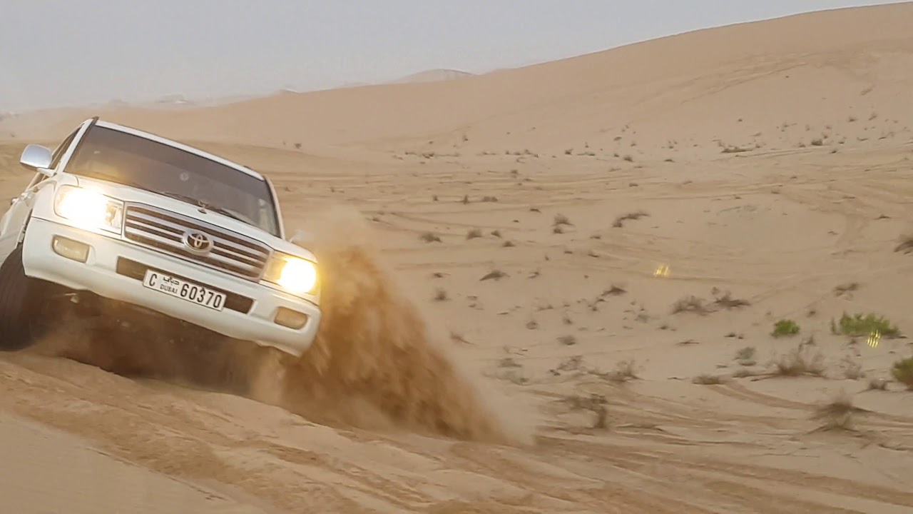 Toyota Land Cruiser j100 in sand dunes - YouTube