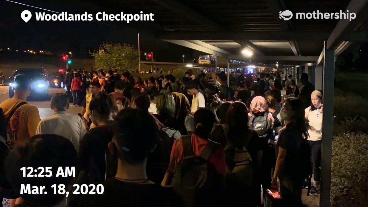 Crowd outside Woodlands Checkpoint as Malaysia goes into lockdown - YouTube