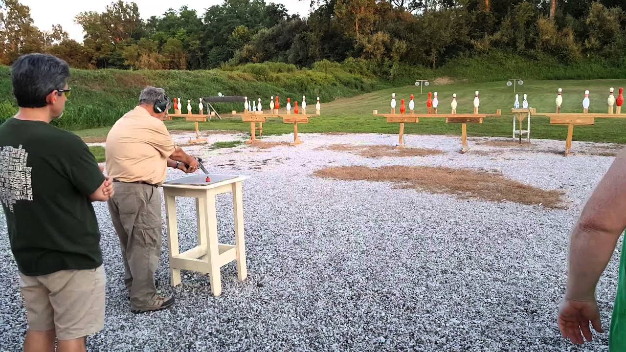 Bowling pin shoot with a revolver at Red Brush Shooting Range - YouTube