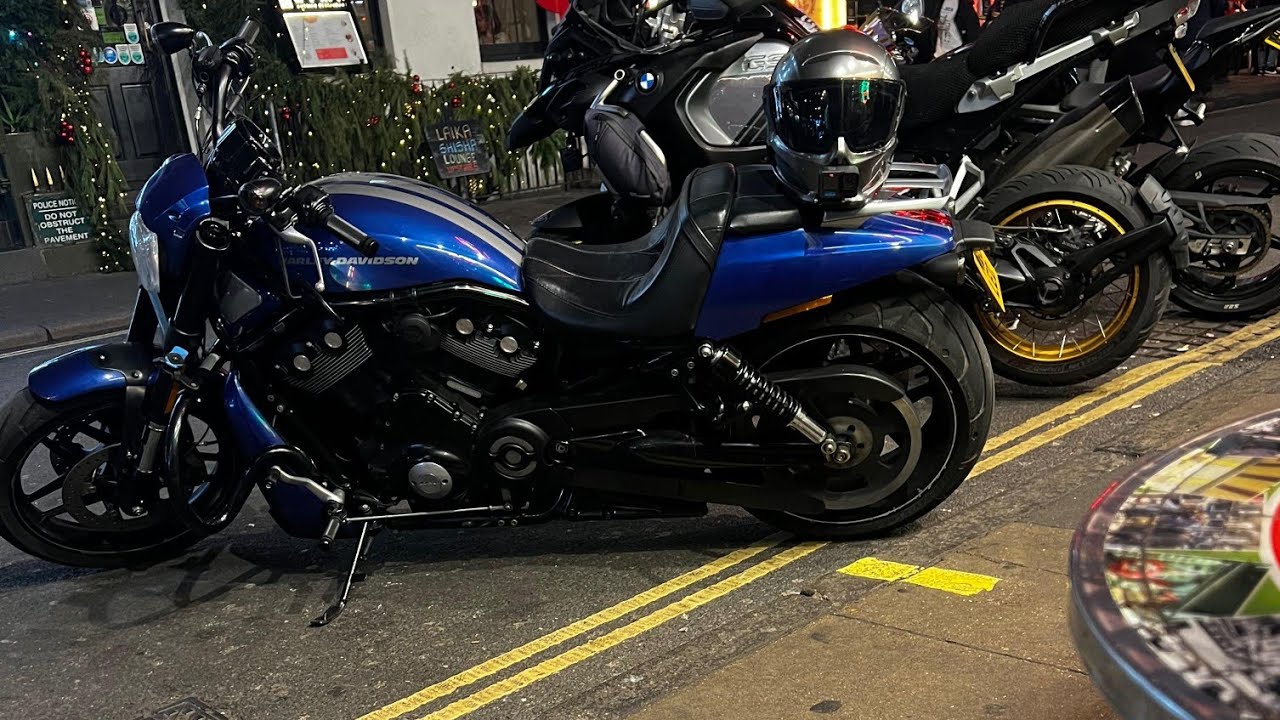 Swerving through London traffic on a Harley-Davidson nightrod special ...