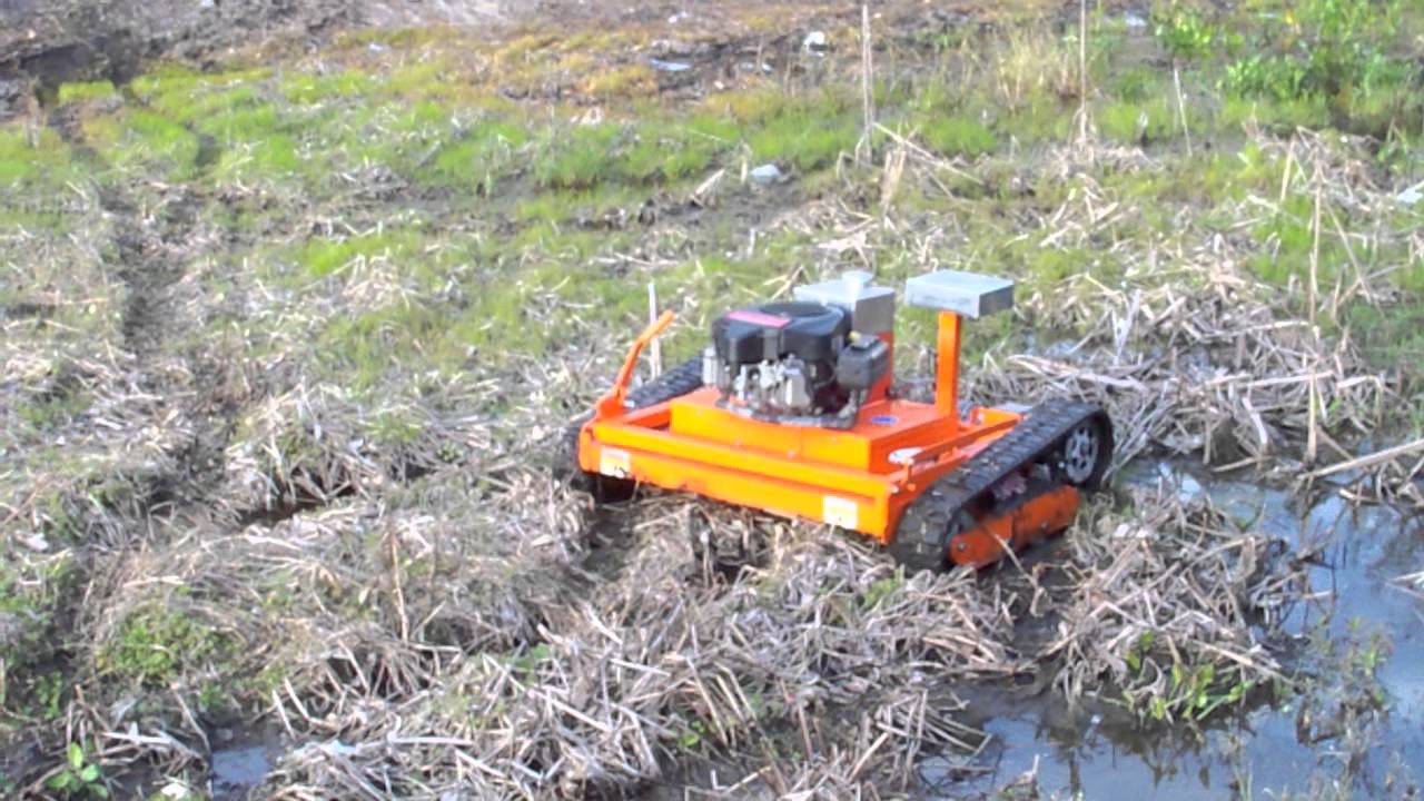 TREX SLOPE MOWER ON WETLAND - YouTube