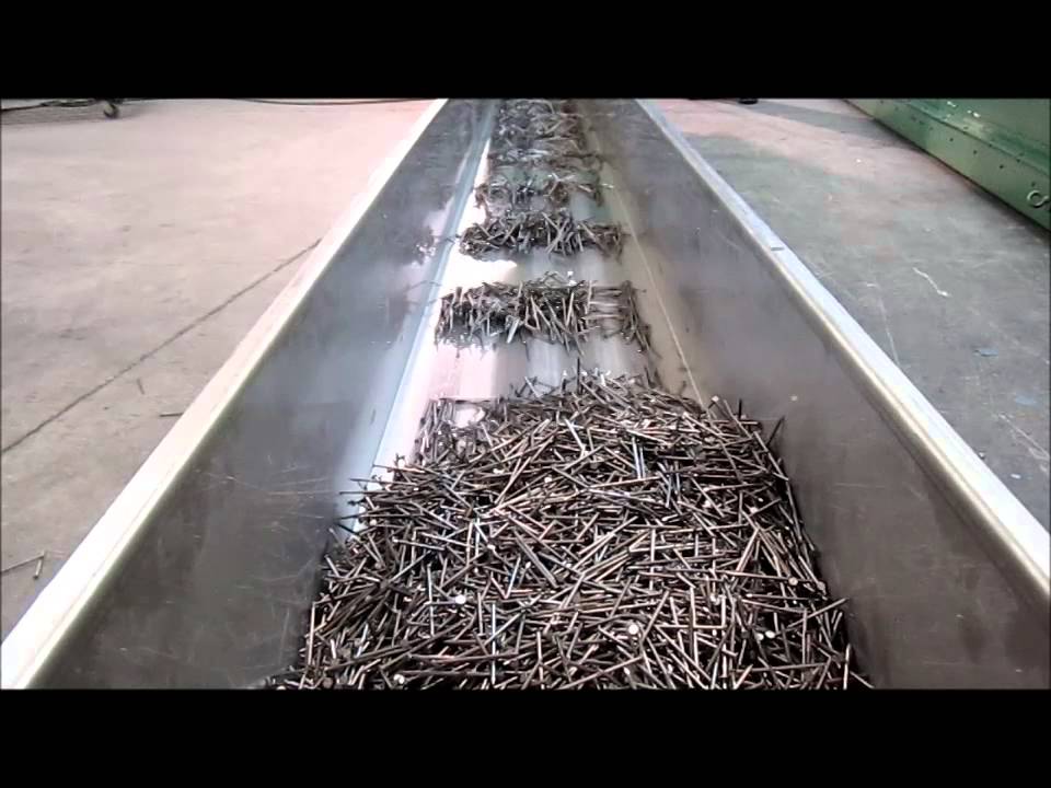 Magnetic Conveyor transferring Nails by Goessling USA - YouTube