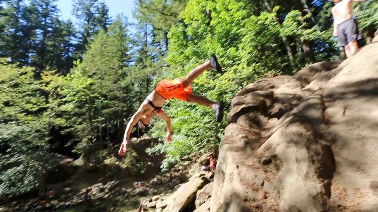 DOING CRAZY TRICKS OFF CLIFF AT WATERFALL!! - YouTube