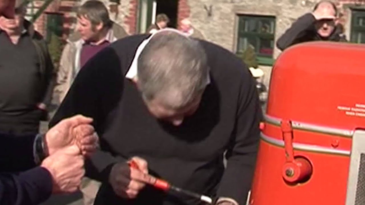 Starting a tractor with a shotgun cartridge - YouTube