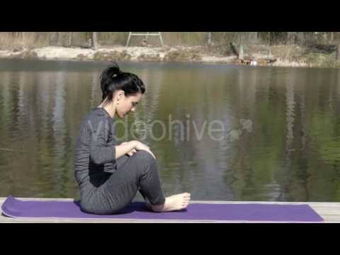 Yoga Teacher Trains His Body. Stretches the Legs.