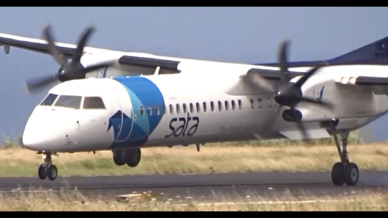 CLOSE UP || SATA Q400 Windy Landing at Ponta Delgada! - YouTube