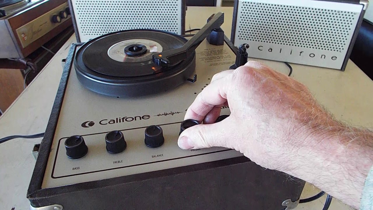 Califone solid-state record player playing a 45 RPM record. - YouTube