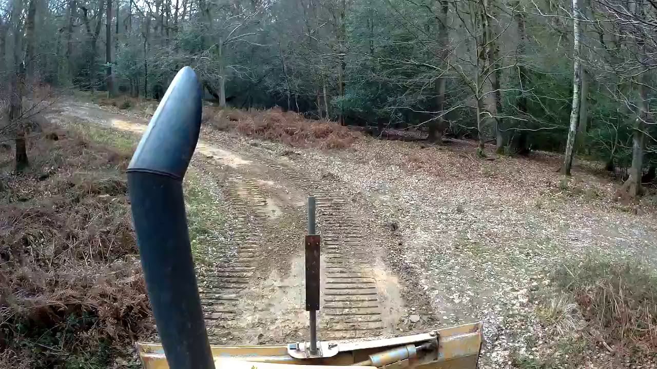 D4H Caterpillar dozer in the woods - YouTube