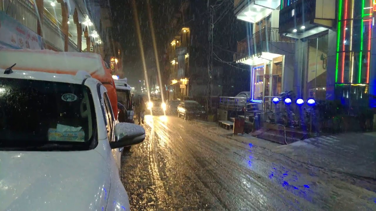 Bahrain city snow falling - YouTube