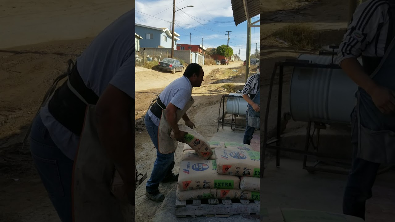cargando sacos de cemento - YouTube