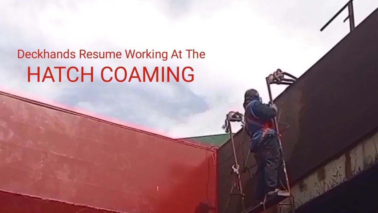 Deckhands Resume Working At The Hatch Coaming Of Cargo Hold #1 ...