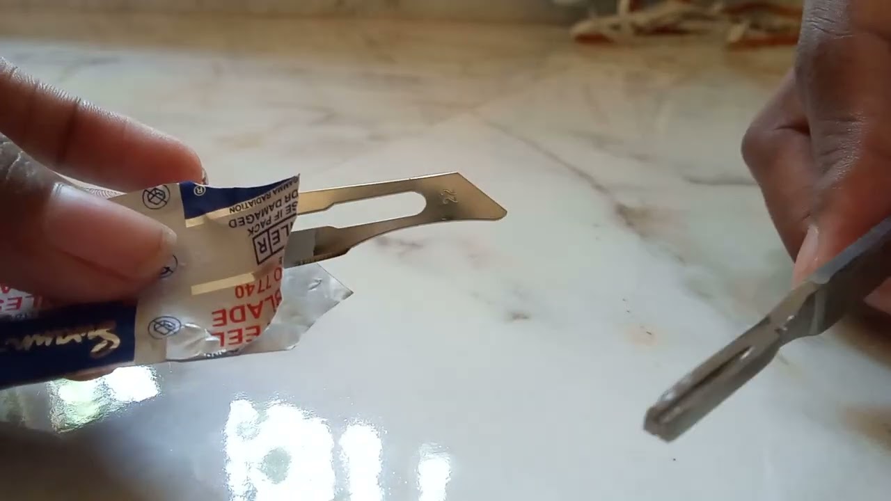 How to attach scalpel blade to scalpel handle - YouTube