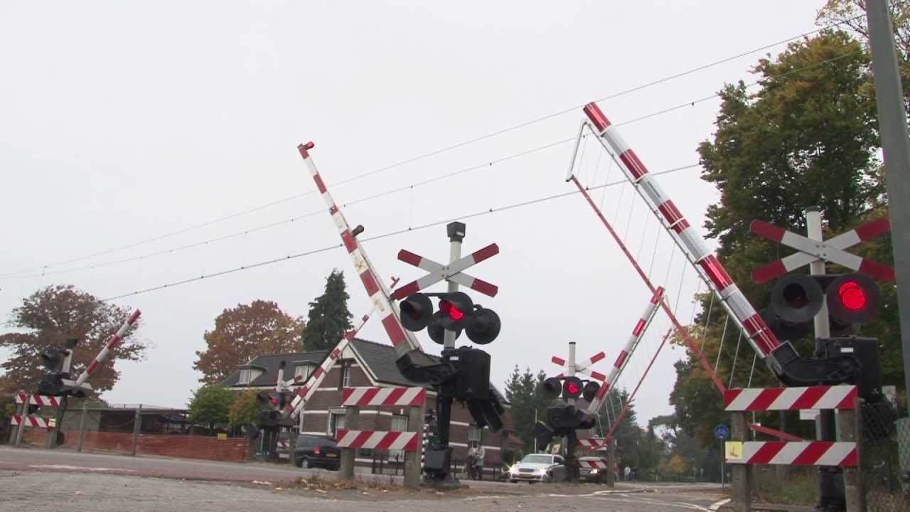 Funny moment by a dutch railroad crossing - YouTube