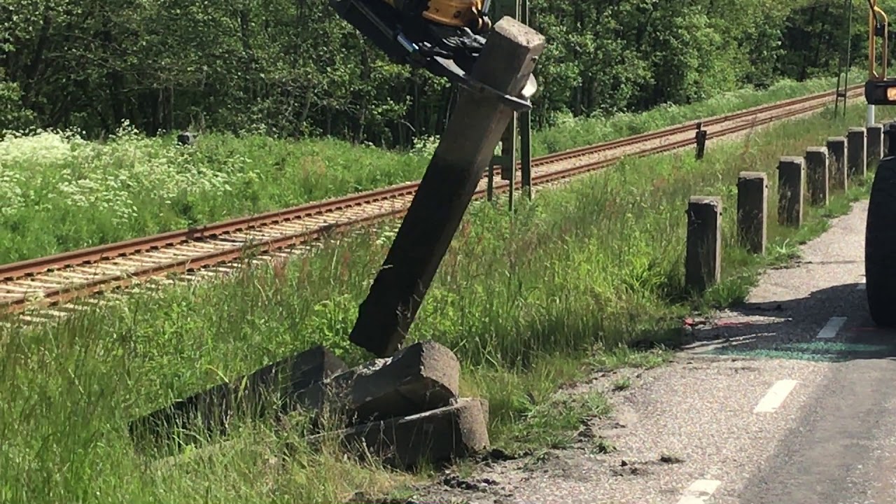 Removing Guardrail poles - YouTube