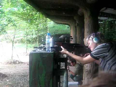 Firing guns at the Chu Chi Tunnels gun range - YouTube