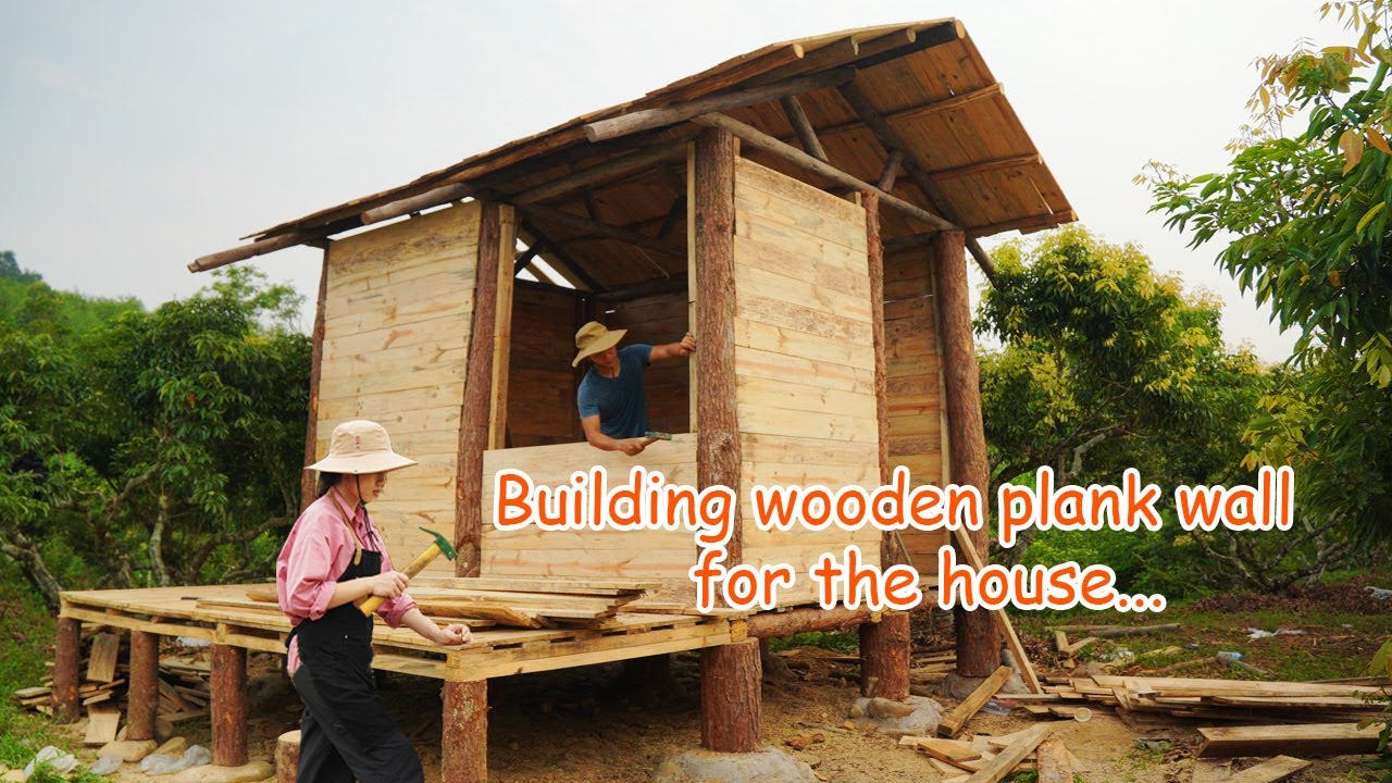 60 days building a wooden house in the forest, building wooden plank ...