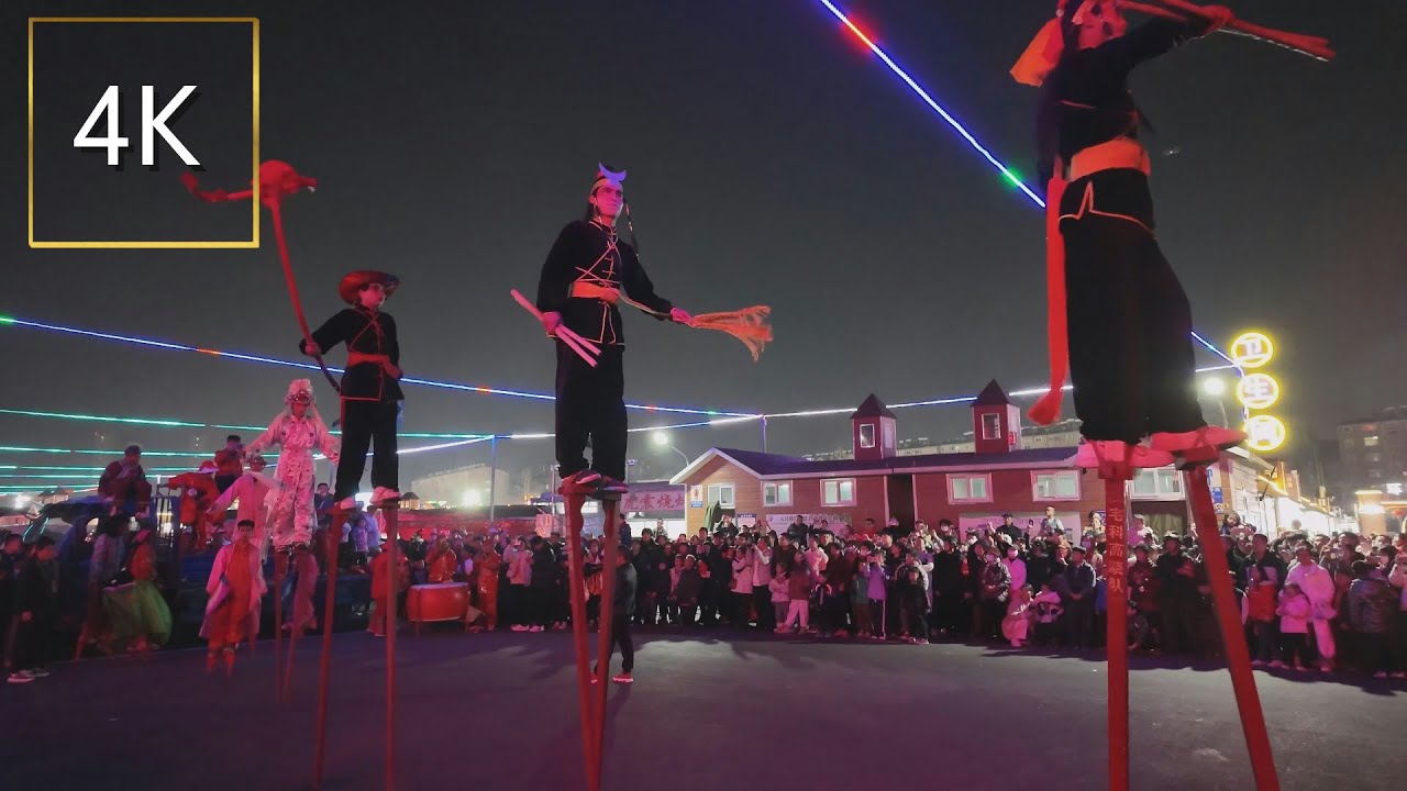 Watch a traditional stilt and dragon dance and experience Chinese folk ...