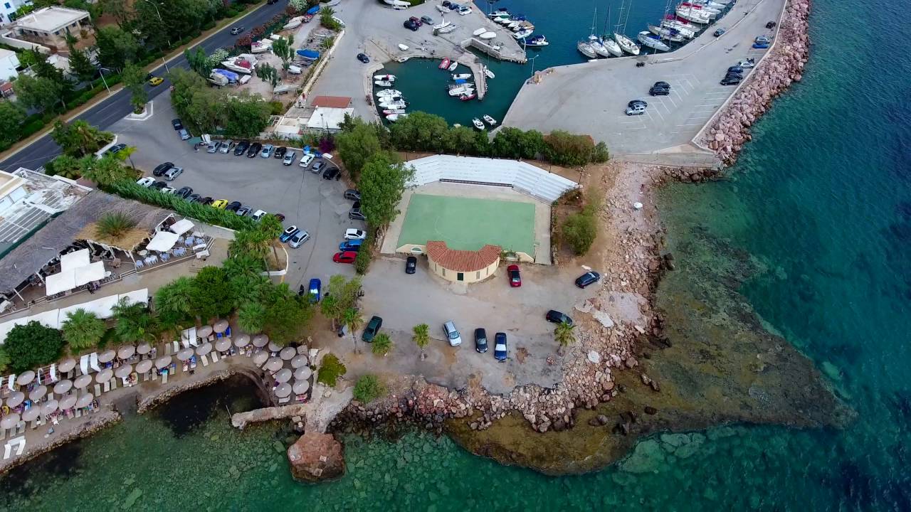 Phantom 4 - 4K Flight over Voula beach area on a cloudy summer day ...
