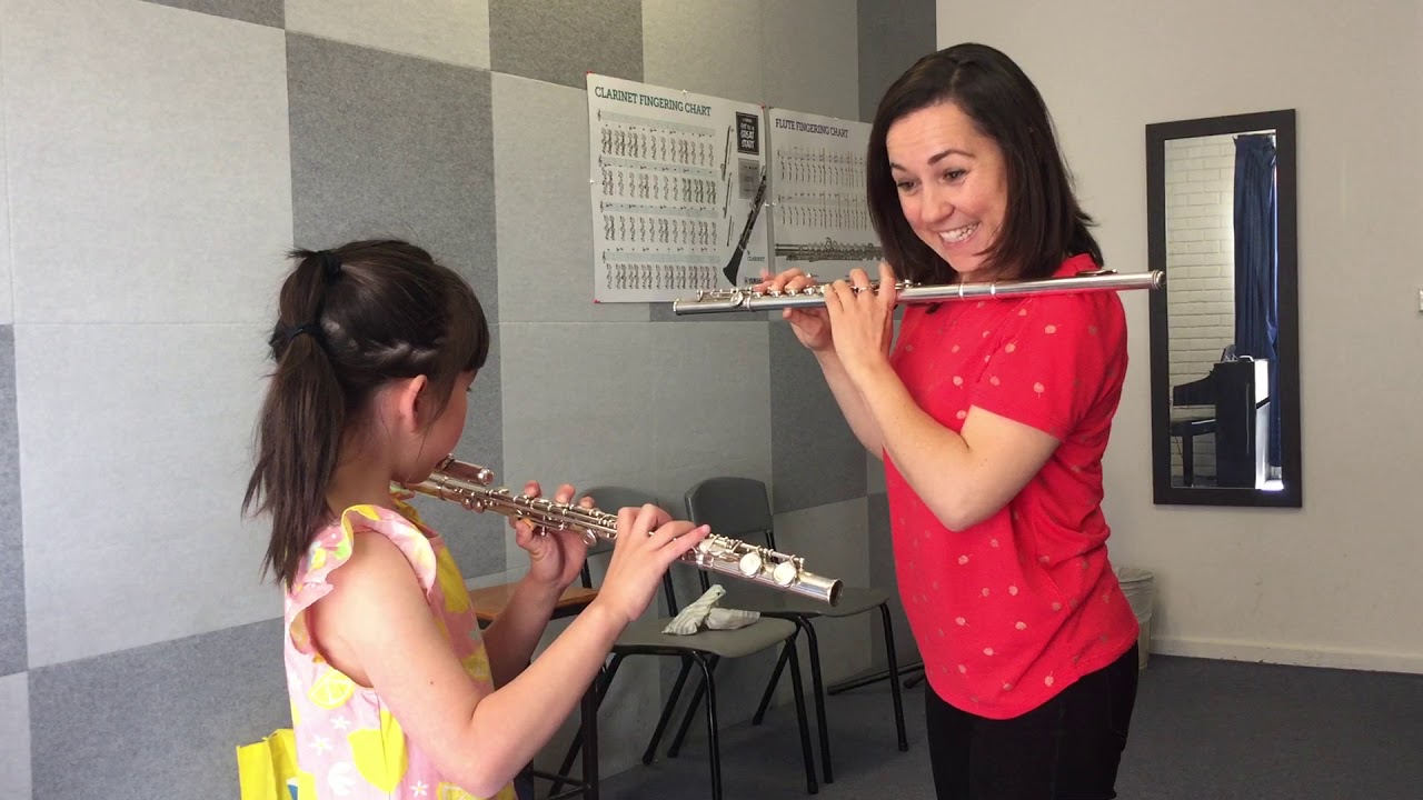 Flute student working on slurring - YouTube