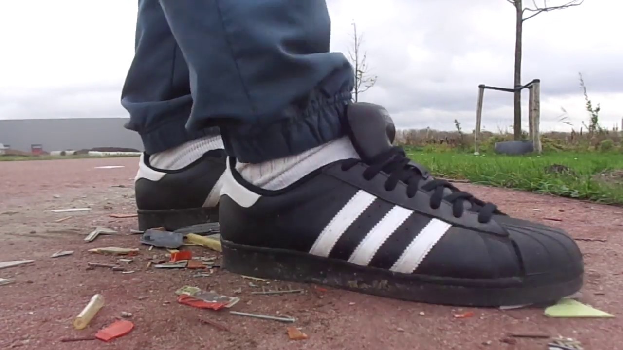 Adidas Superstar crush, stomp and destroy some toy train model houses ...