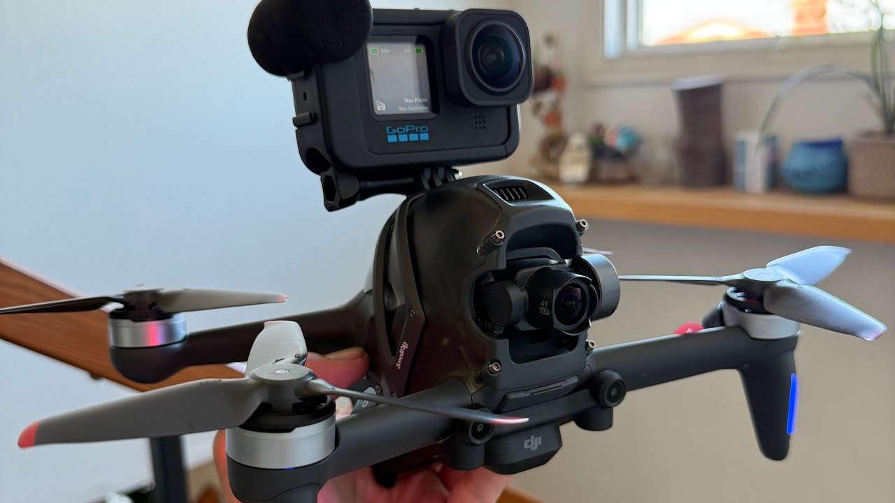 Flying DJI FPV drone with GoPro Hero 10 Black attached to drone ...