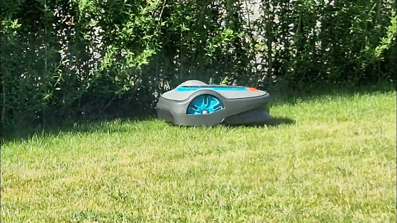 our first grass cutting robot - YouTube