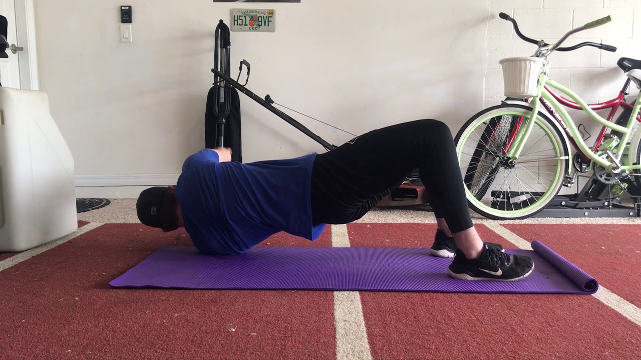 Glute bridge to diagonal reach - YouTube