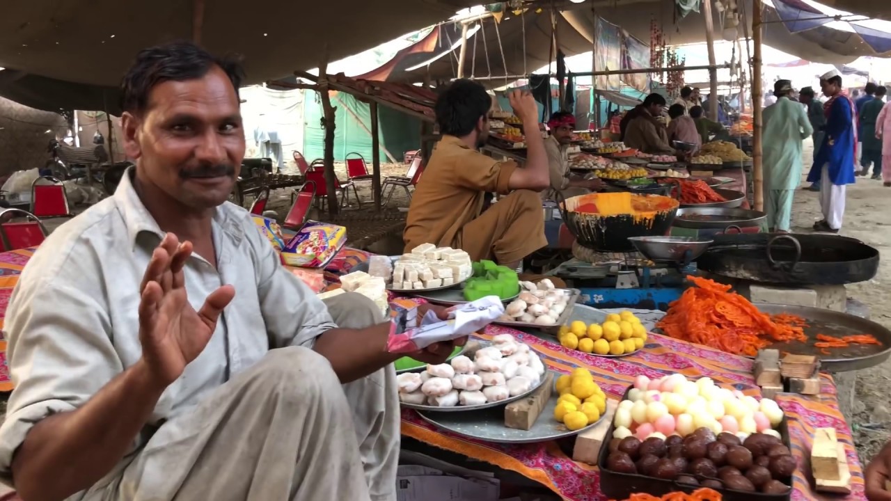 village are enjoying of peer adil Cultural Fair (Mela میلہ) in Dera ...