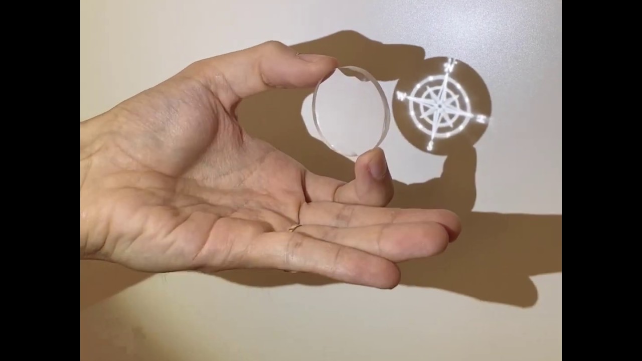 Caustic lens projecting a compass - YouTube