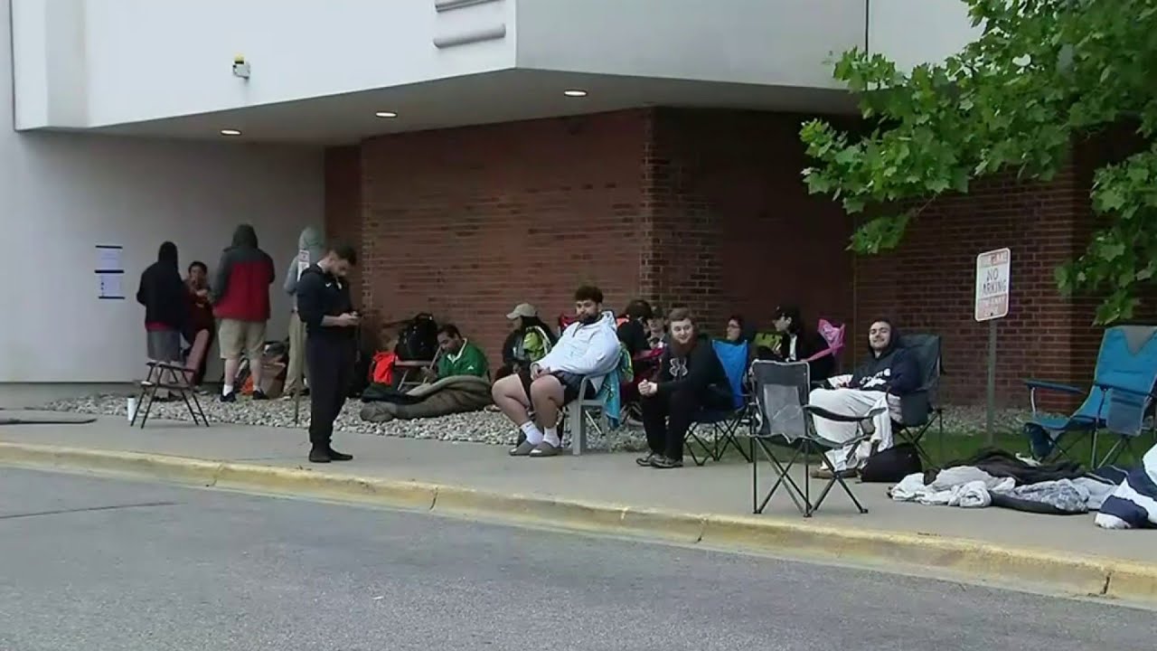 People line up overnight for computer graphics cards - YouTube