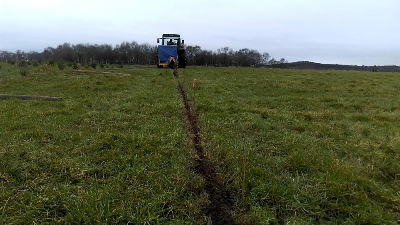 Tractor mounted tree planter - YouTube