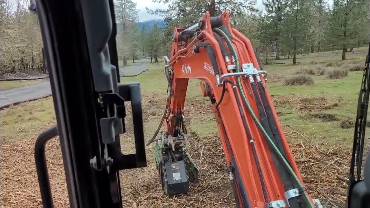 Mulching Kubota kx-040 and FX26 Defender - YouTube