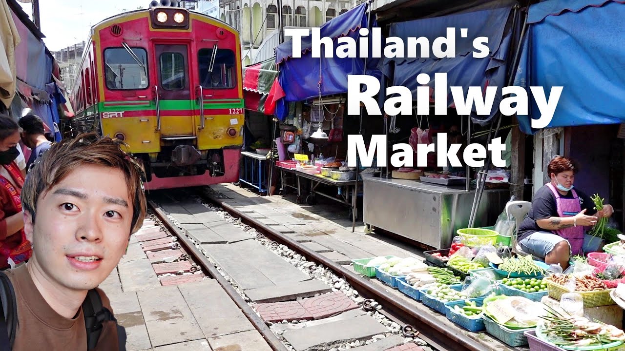 A Train Runs Through This Dangerous Market // Thailand Travel 2022 ...