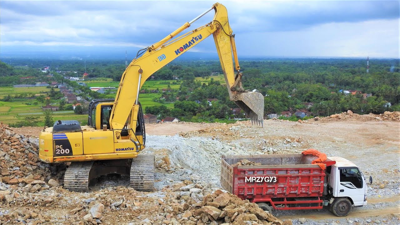 Komatsu PC200 Excavator Digging Cutting Dirt On The Top Of The Hill ...