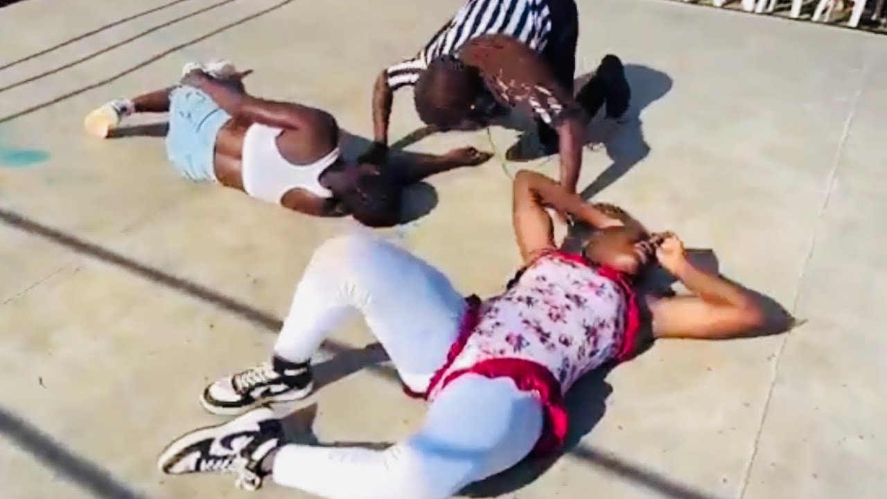 African WWE Women Wrestling at Softground mud wrestling Uganda - YouTube