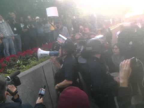 LAPD giving an order to disperse... with help from the human mic! - YouTube