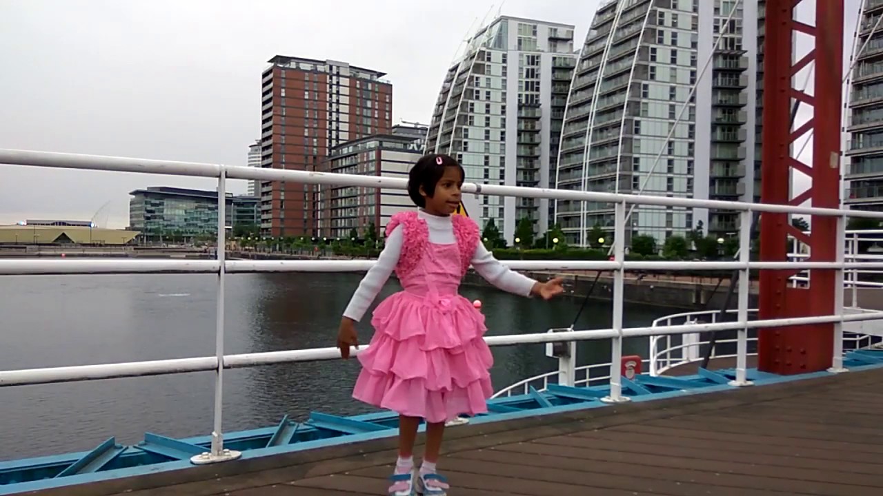 Priyoti singing and dancing on Salford Quays Media City Railway Bridge ...