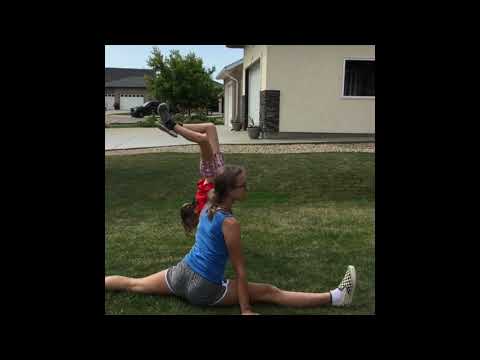 Trying to hold a hand stand, my friend Caitlin doing the splits!