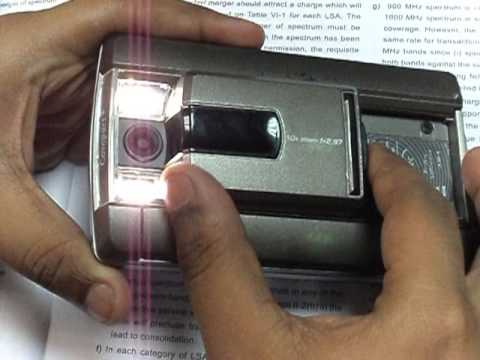 Using an Optelec Compact+ Handheld Video Magnifier - YouTube