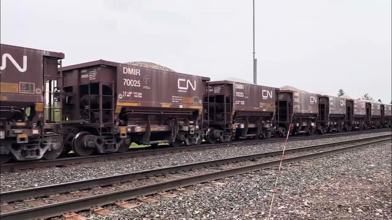 CN 3311 leads a limestone train thru Adolph, MN to MinTac - YouTube