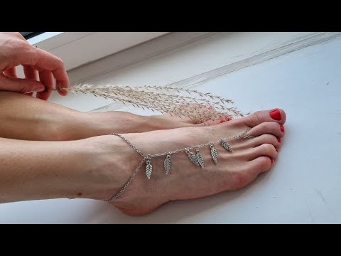 Girl Sits On Window Sill And Makes Foot Massage. Feet Show