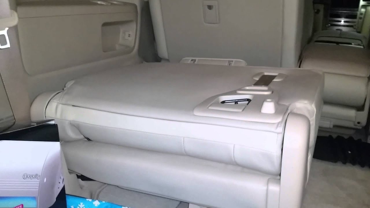 Third row power folding seats - YouTube