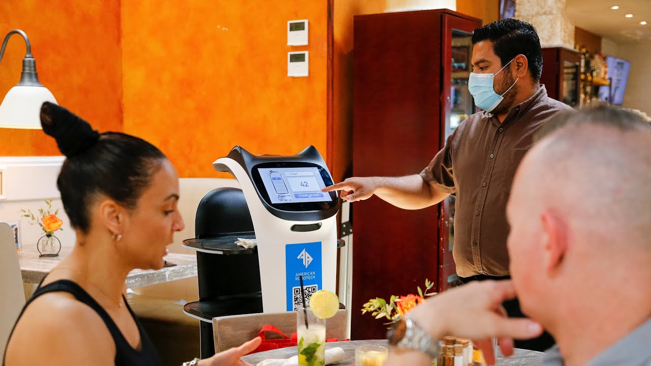 Watch talking robots deliver food at Dallas restaurant - YouTube