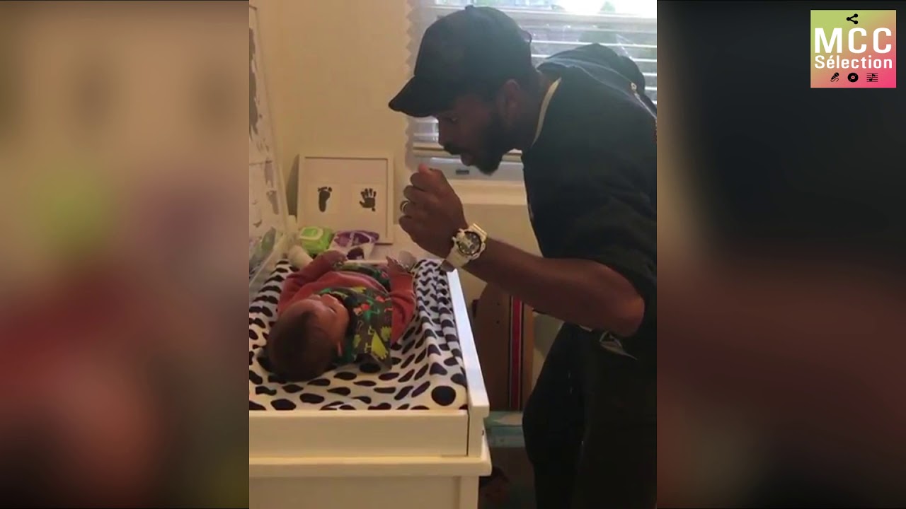 Father and son laugh while singing and dancing to a reggae chorus - YouTube