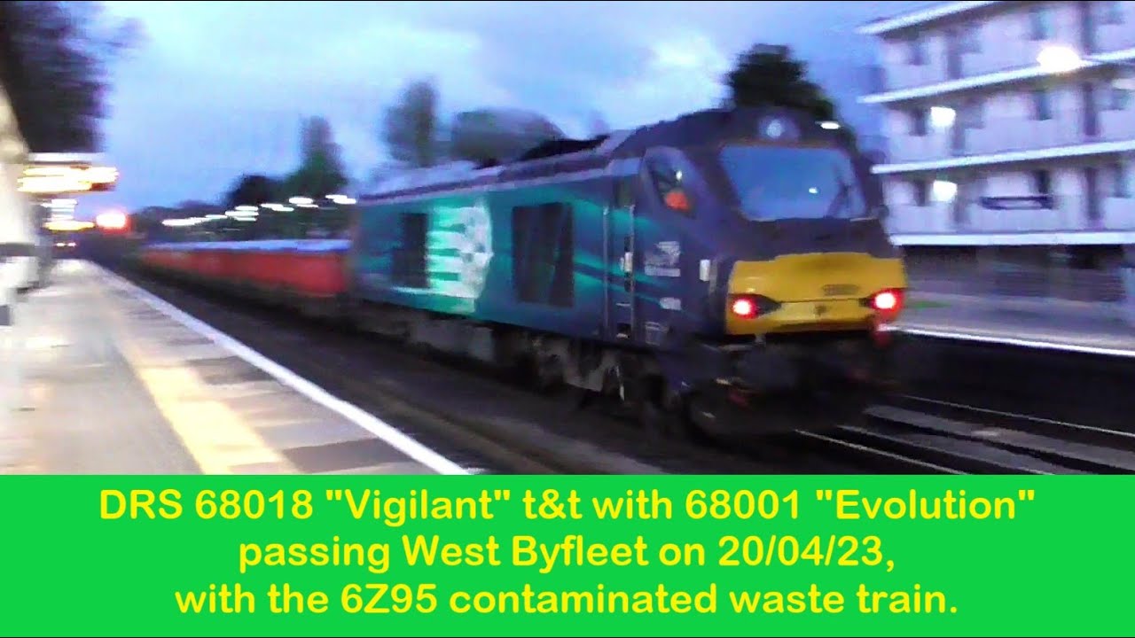 DRS 68018 "Vigilant" t&t with 68001 "Evolution" passing West Byfleet on ...