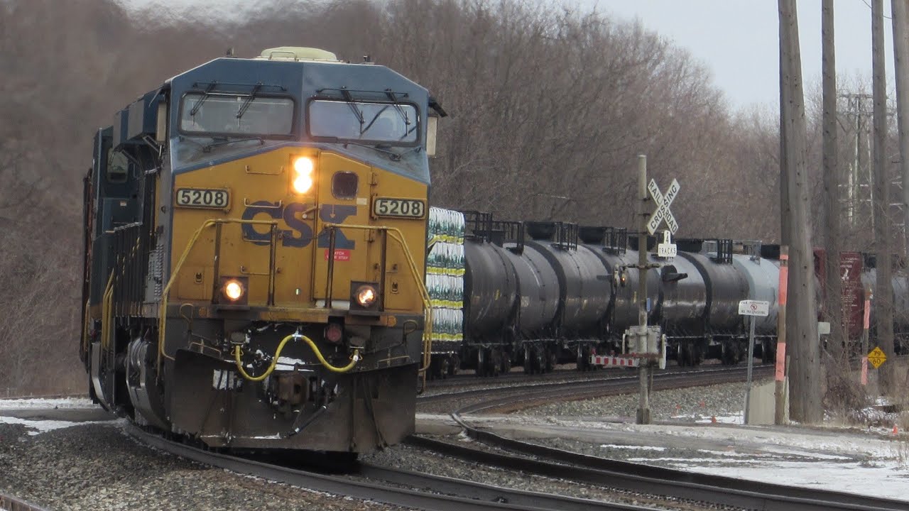 CSX manifest train with a touch of blue primer paint on the leading ...