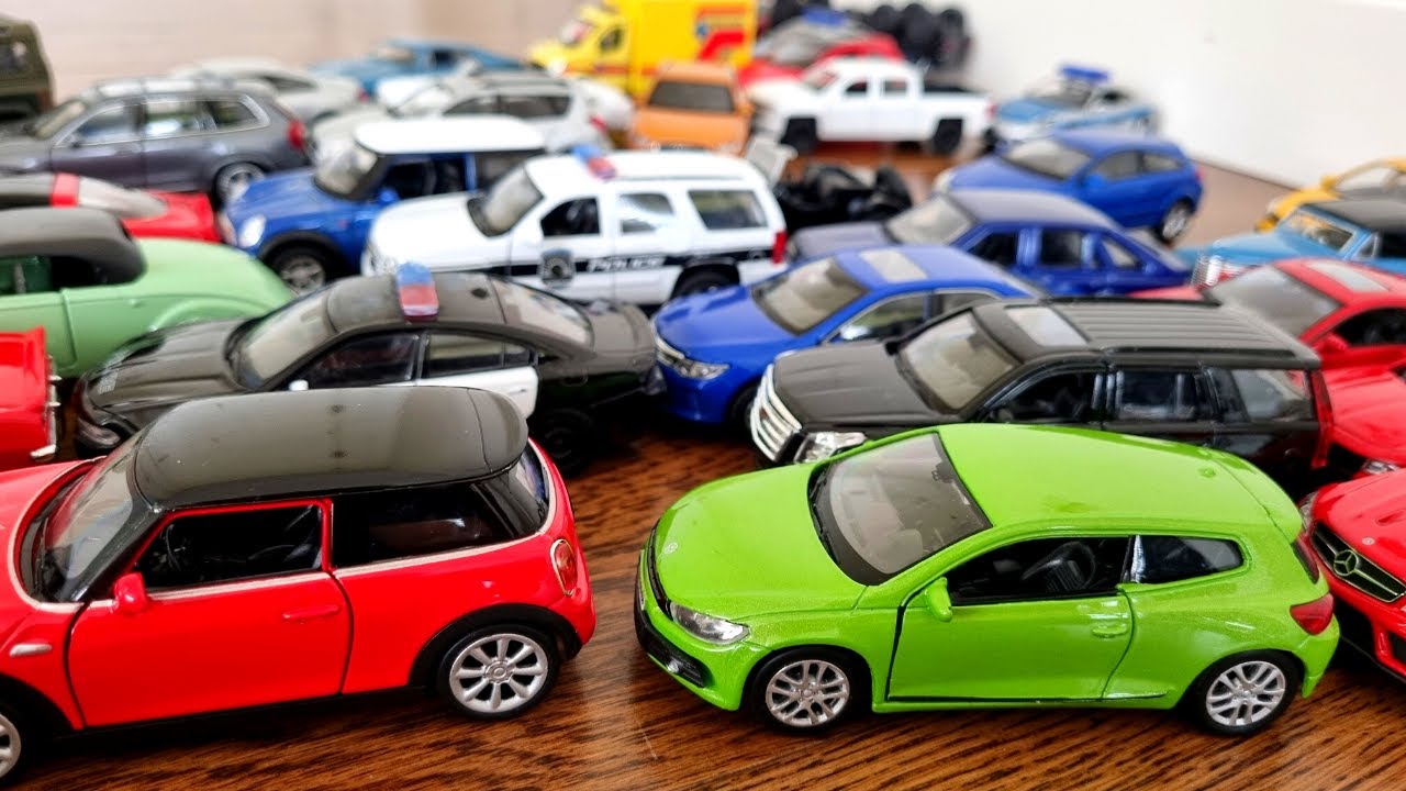 Diecast Model Cars driving up on the slope into the box ...