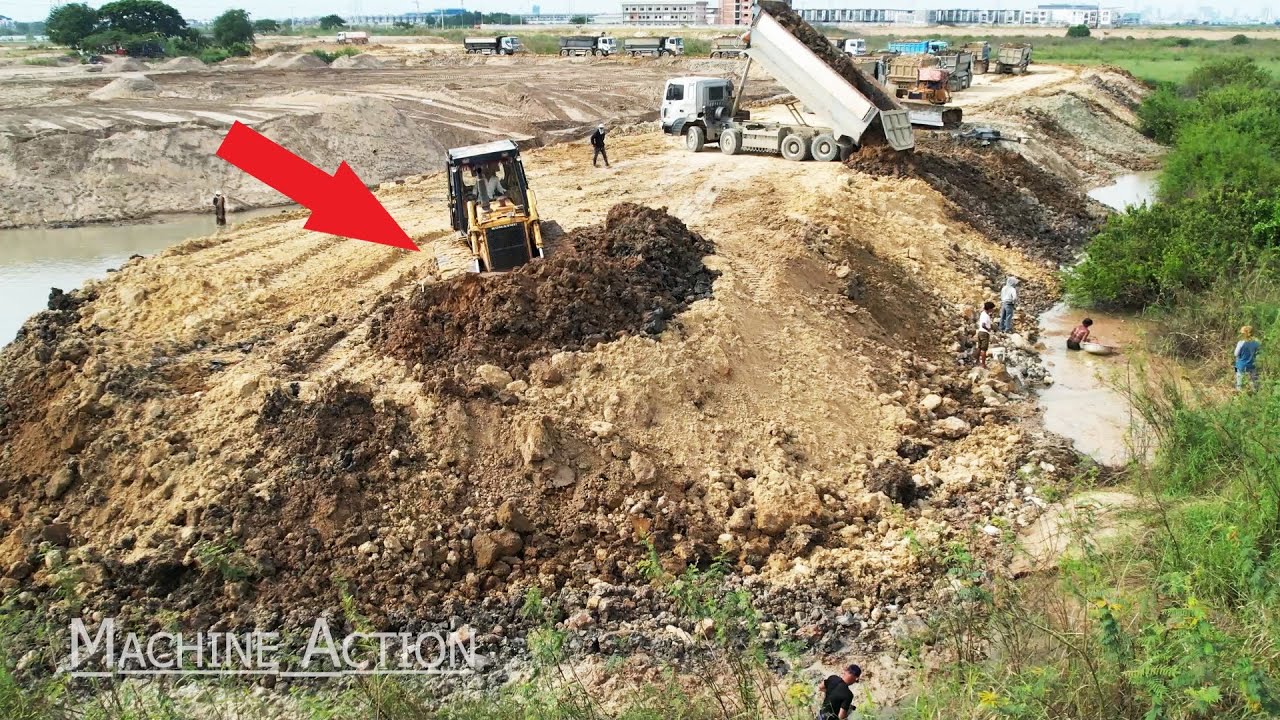 The Best, Land Filling Up Process Bulldozer Moving soiled slop Road ...