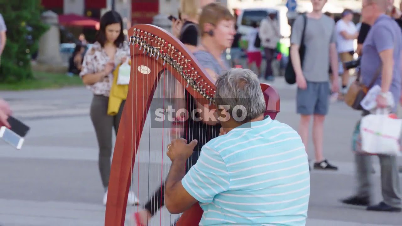 A Street Performer Playing The Harp In Madrid, Spain - YouTube
