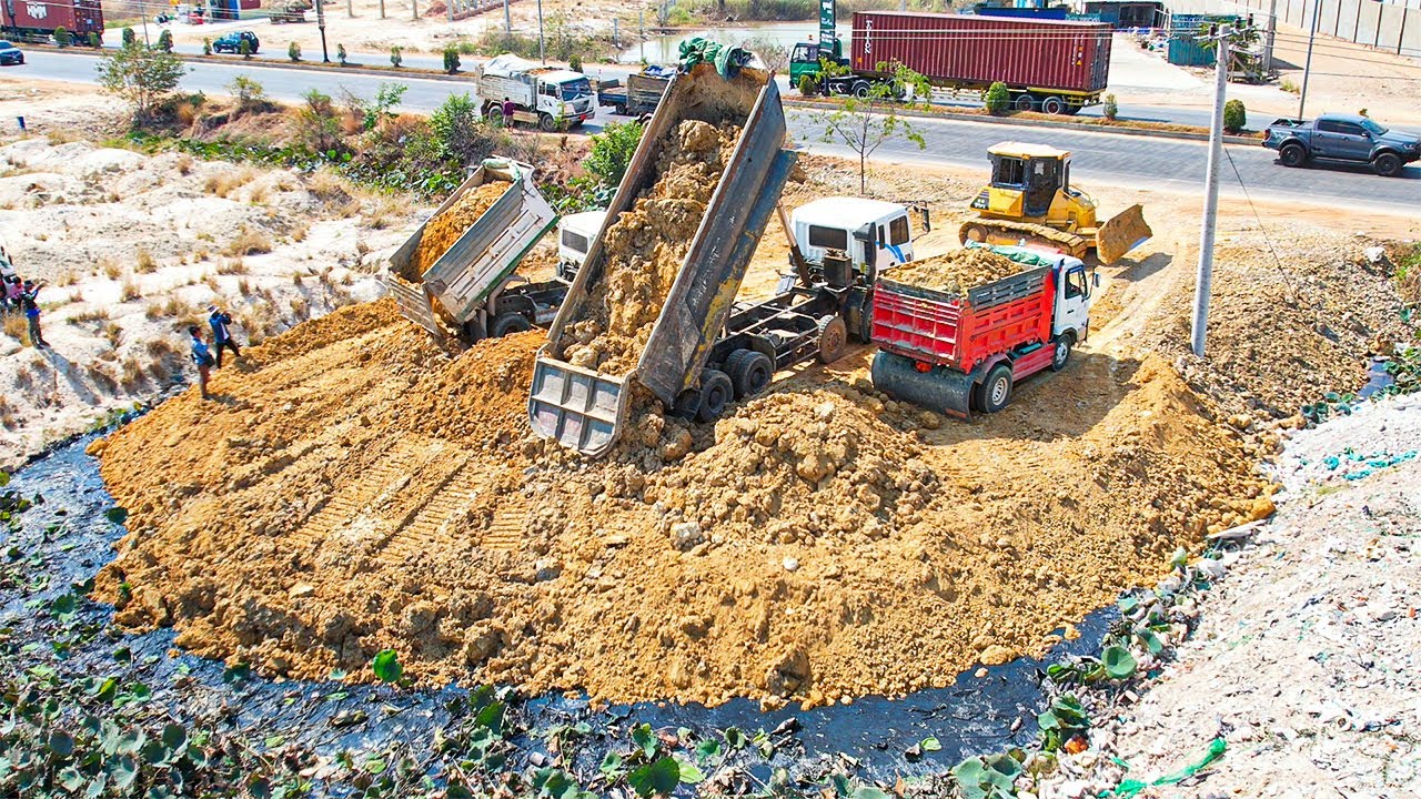 Amazing Display Of Dozer And Dump Trucks Building Top New Road Crossing ...
